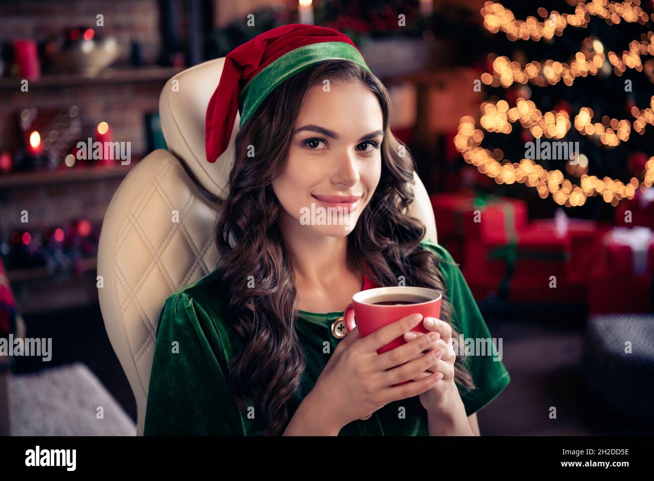Portrait of attractive dreamy cheerful girl elf drinking latte beverage ...