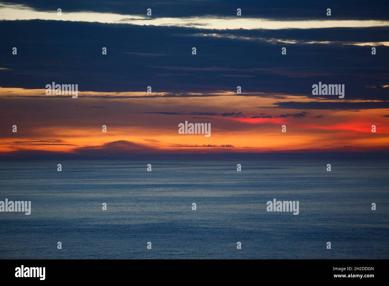 Coastal ocean sunrise over dark hi-res stock photography and images - Alamy