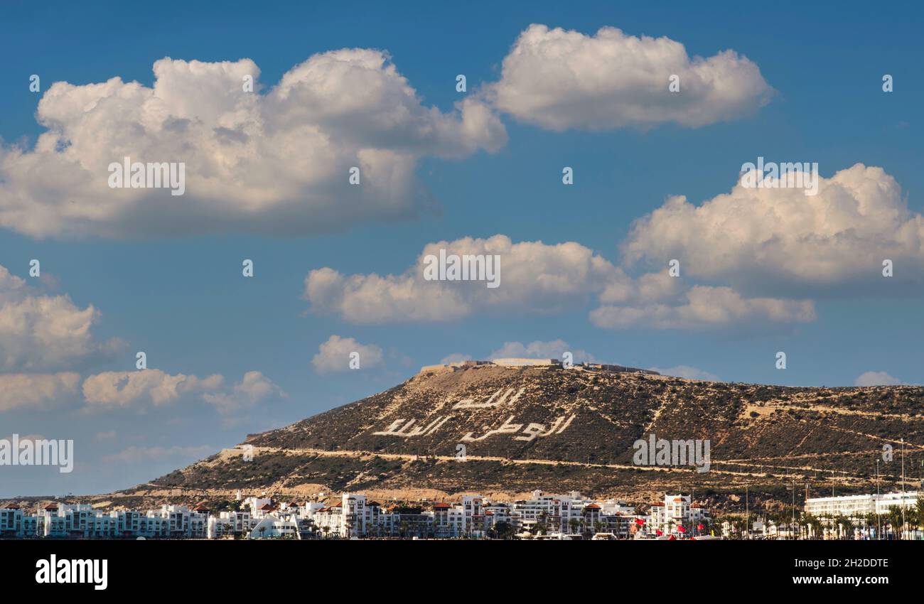 scenic view of Mountain in agadir with text in arabic saying god ...