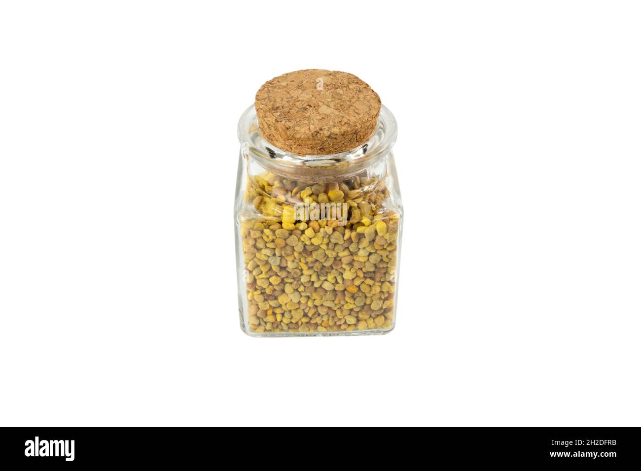 Bee pollen in a glass jar isolated on white background. natural herbal ...