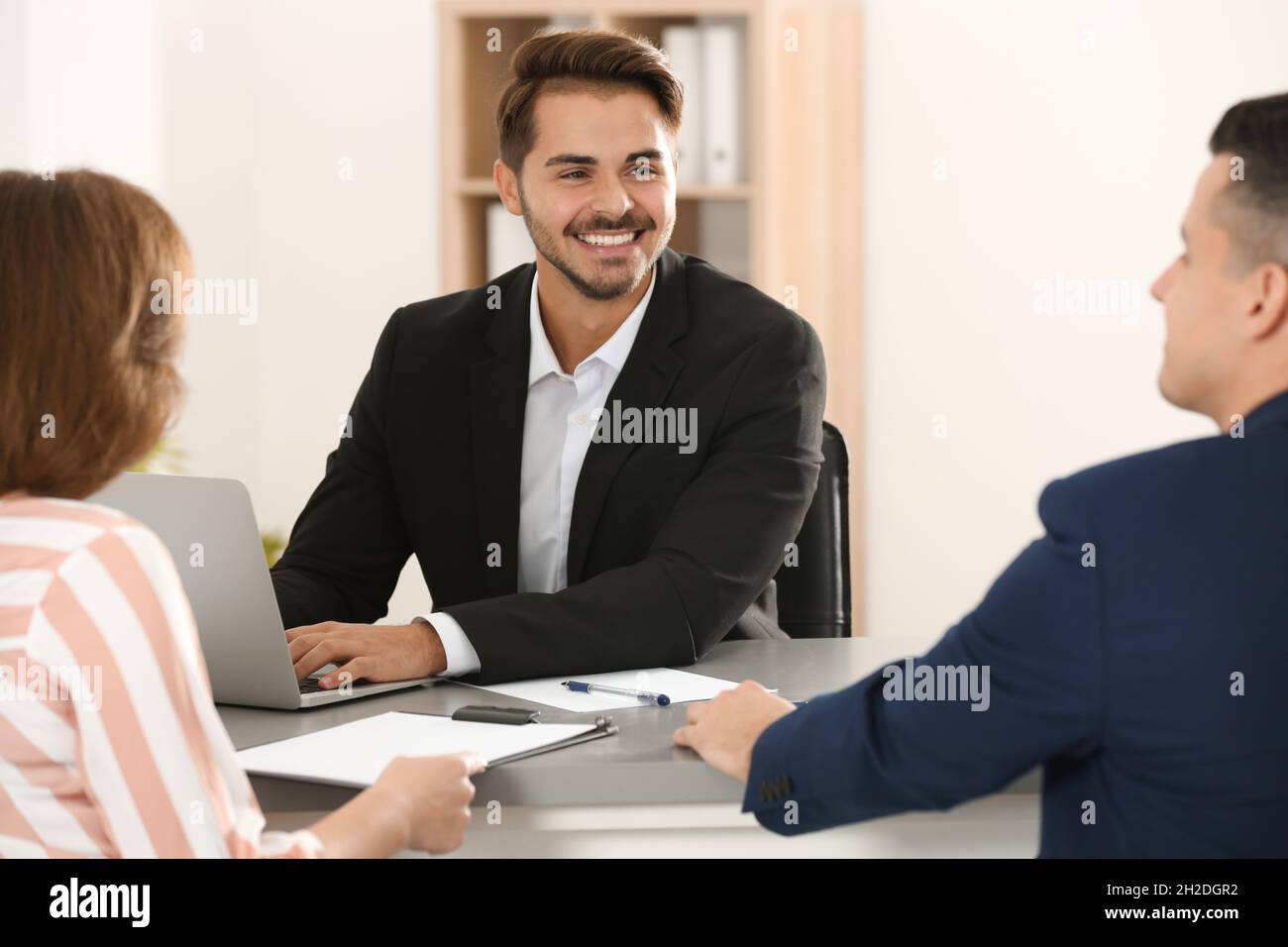 Human resources manager conducting job interview with applicants in office Stock Photo - Alamy