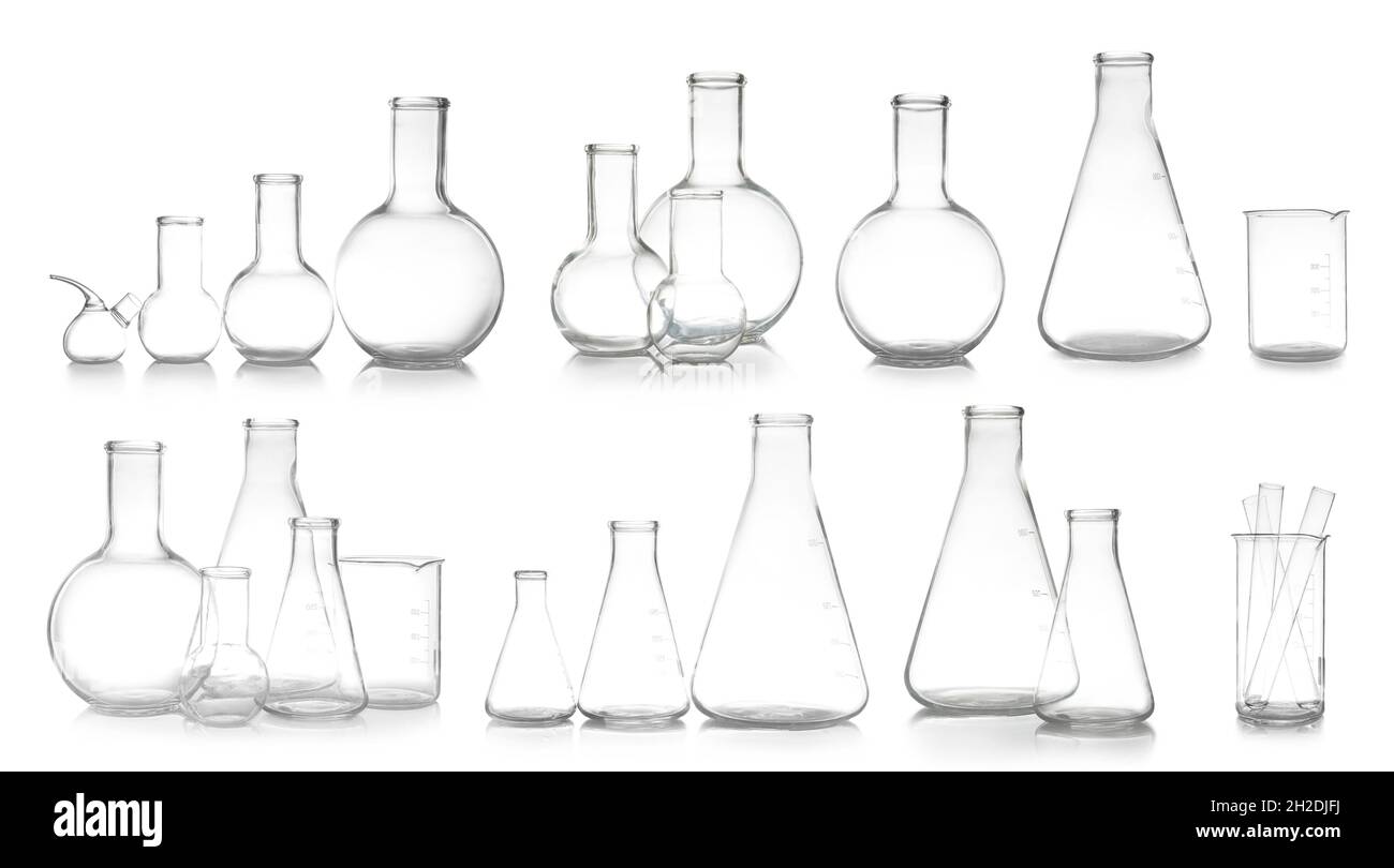 Set with different empty laboratory glassware for analysis on white ...