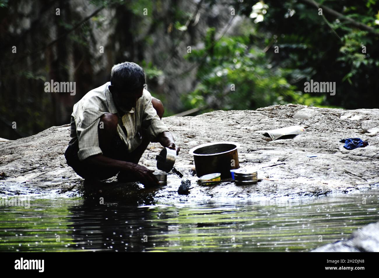 Man near river hi-res stock photography and images - Alamy