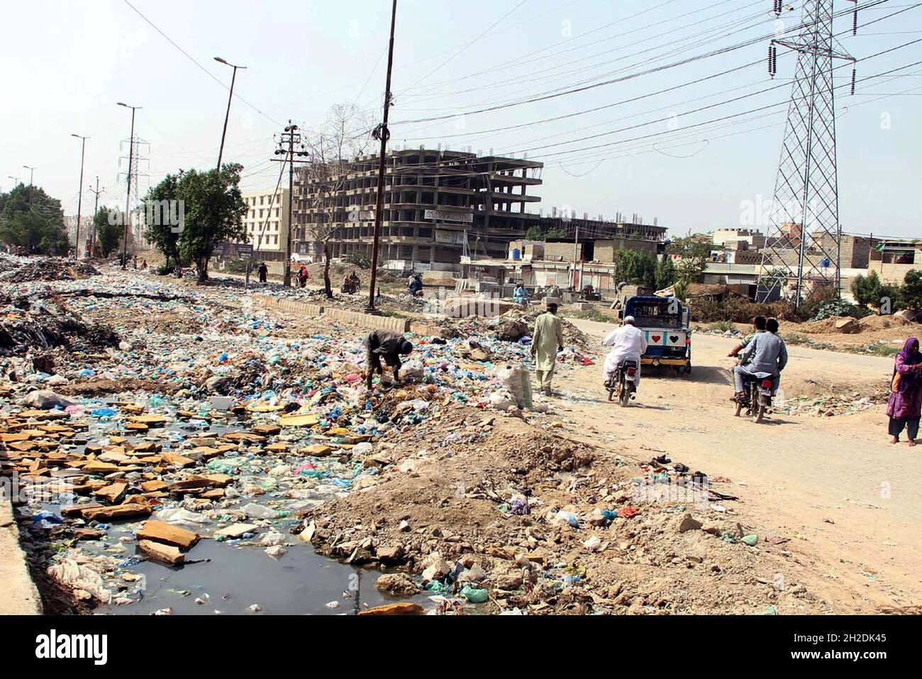 View of huge heap of garbage creating problems for commuter, causing ...