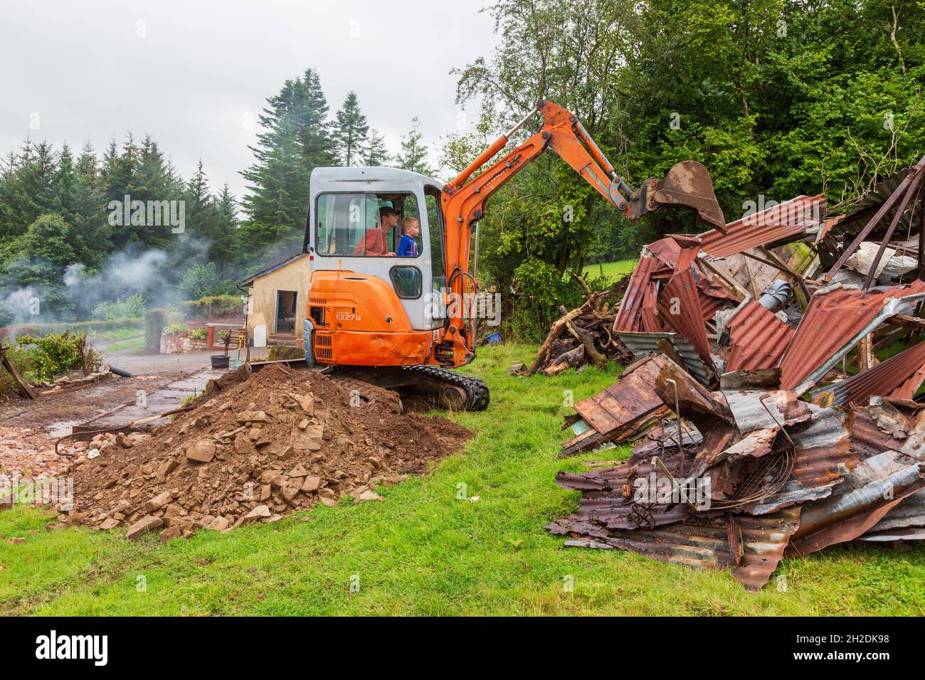 Orange mini digger, High Bickington, Devon, England, United Kingdom ...