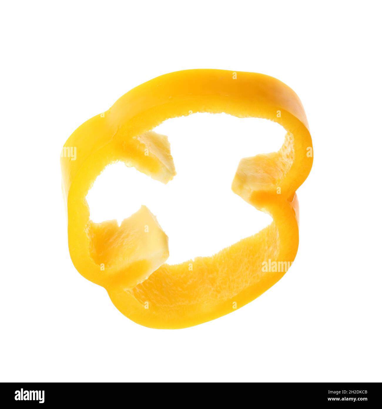 Slice of ripe bell pepper on white background Stock Photo - Alamy