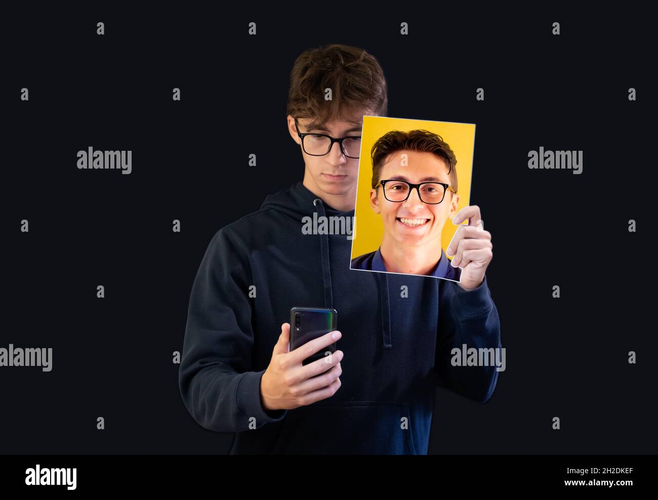 Student boy showing a different face on social network. Fake positive ...