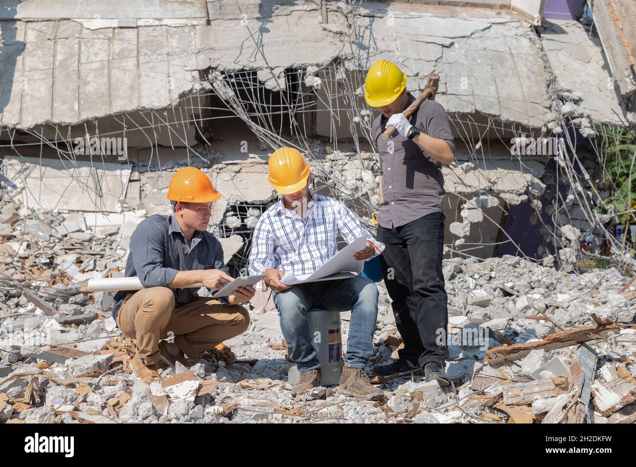 Demolition control supervisor and contractor discussing on demolish ...