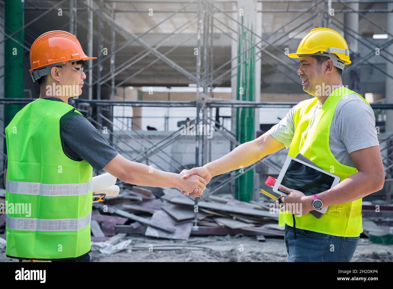 Teamwork, partnership, gesture concept. Builders greeting each other ...