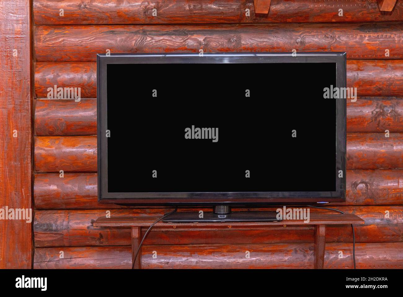 Lcd TV Set in Log Wood Cabin House Stock Photo - Alamy