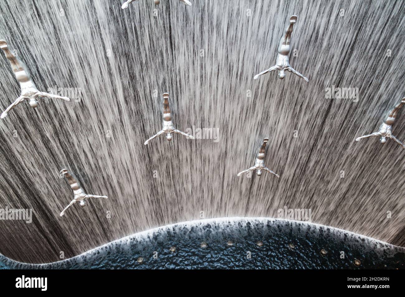DUBAI, UAE - MARCH 12, 2017: Human waterfall in the Dubai Mall, one of ...