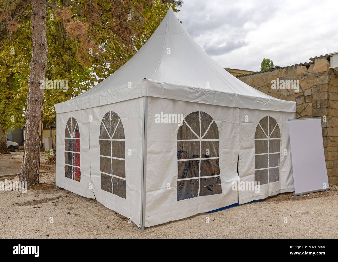 White Plastic Canopy Party Tent With Windows Stock Photo - Alamy
