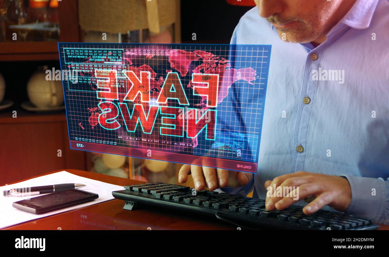 Fake news on computer screen. Broadcast, trolling, false information ...