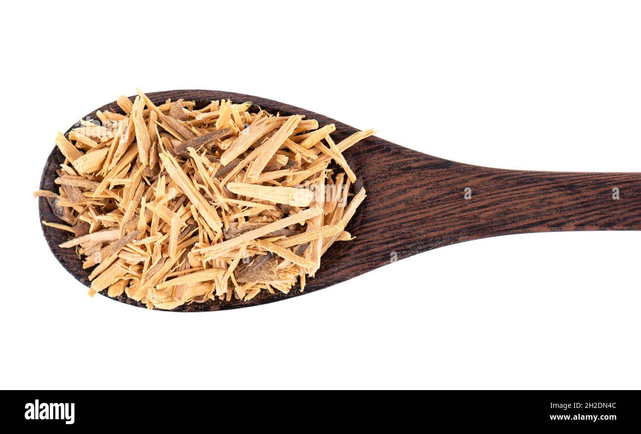 Muira Puama herbal tea in wooden spoon, isolated on white background ...