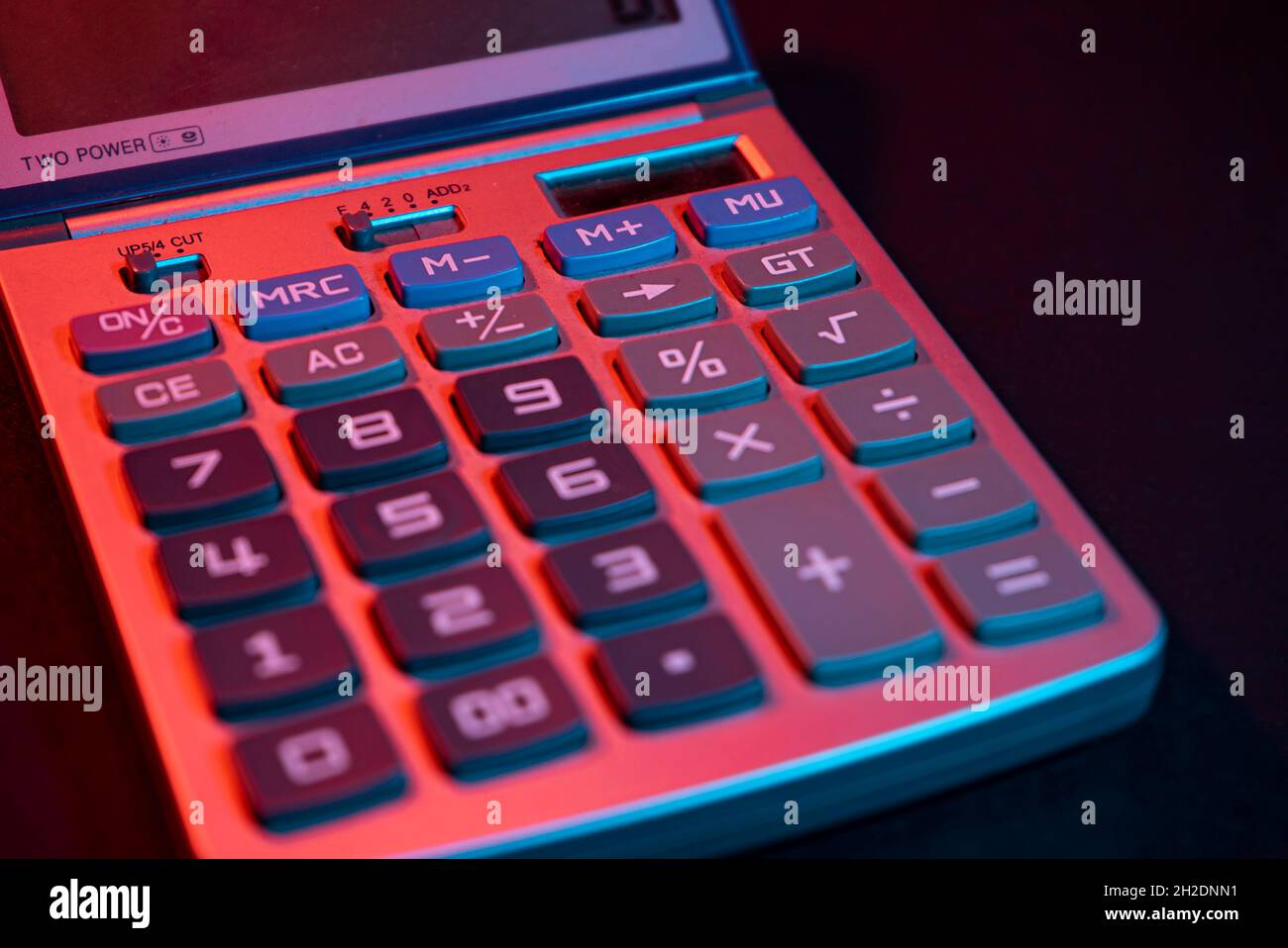 Calculator keyboard detail with dark background Stock Photo - Alamy