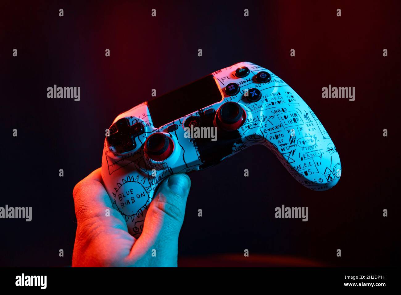 Gamer Hands detail with joypad during paly Stock Photo - Alamy