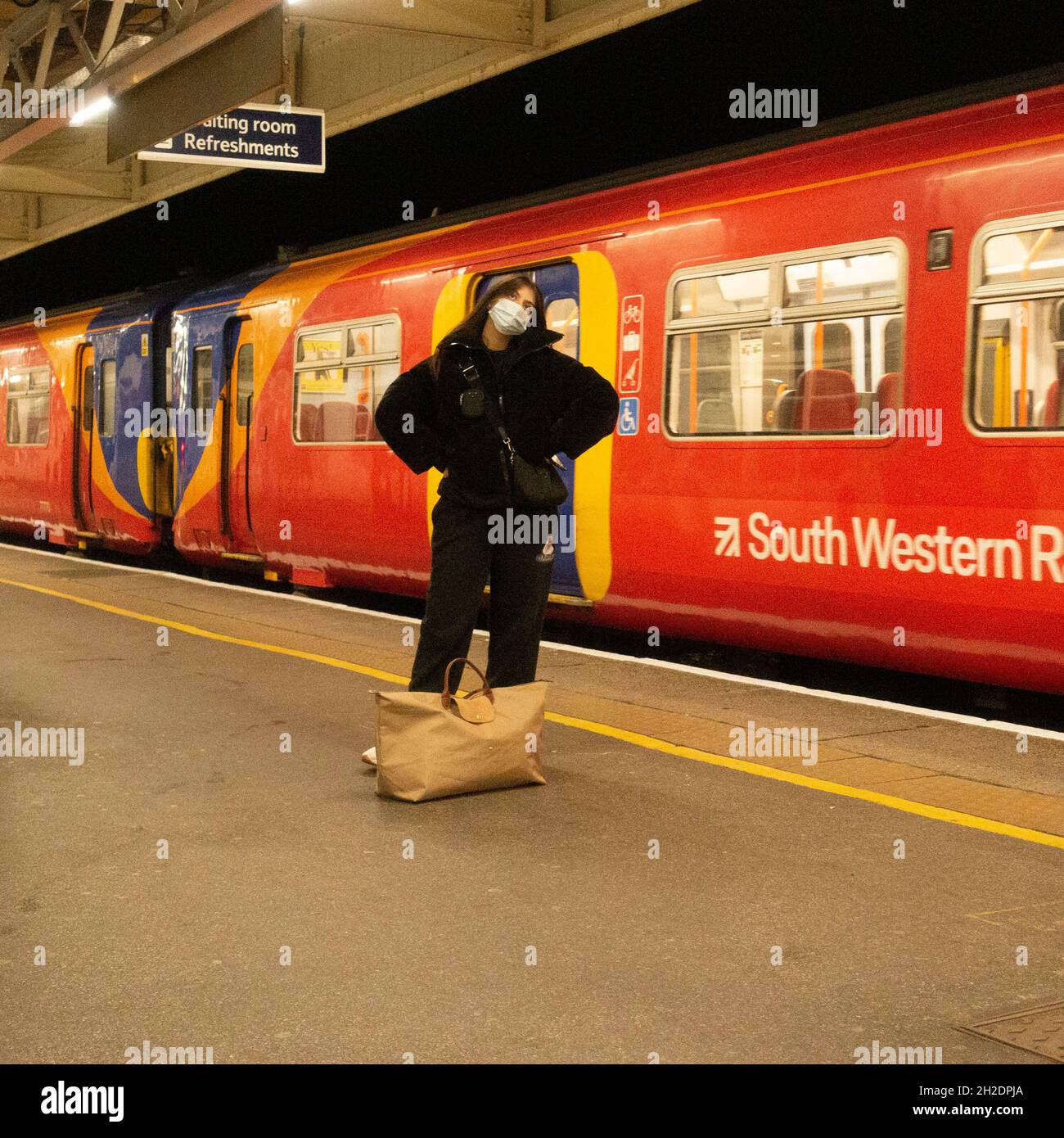 Waiting for a Train Stock Photo - Alamy
