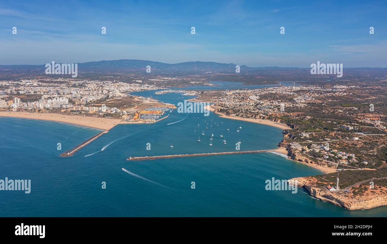 Aerial view of the panorama of the sea bay of Portimao, marinas with ...