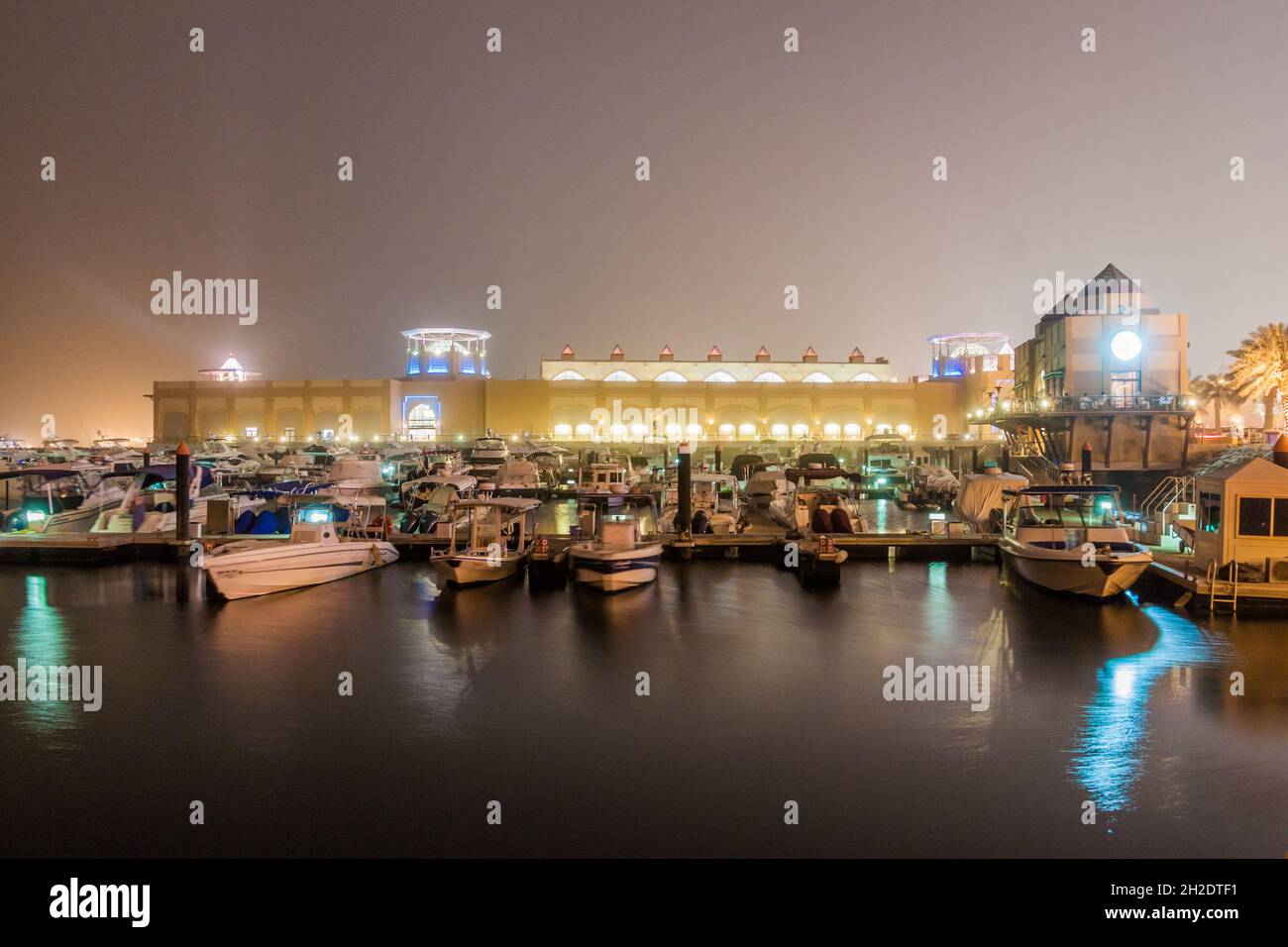 FAHAHEEL, KUWAIT - MARCH 16, 2017: Night view of a marina next to Al ...