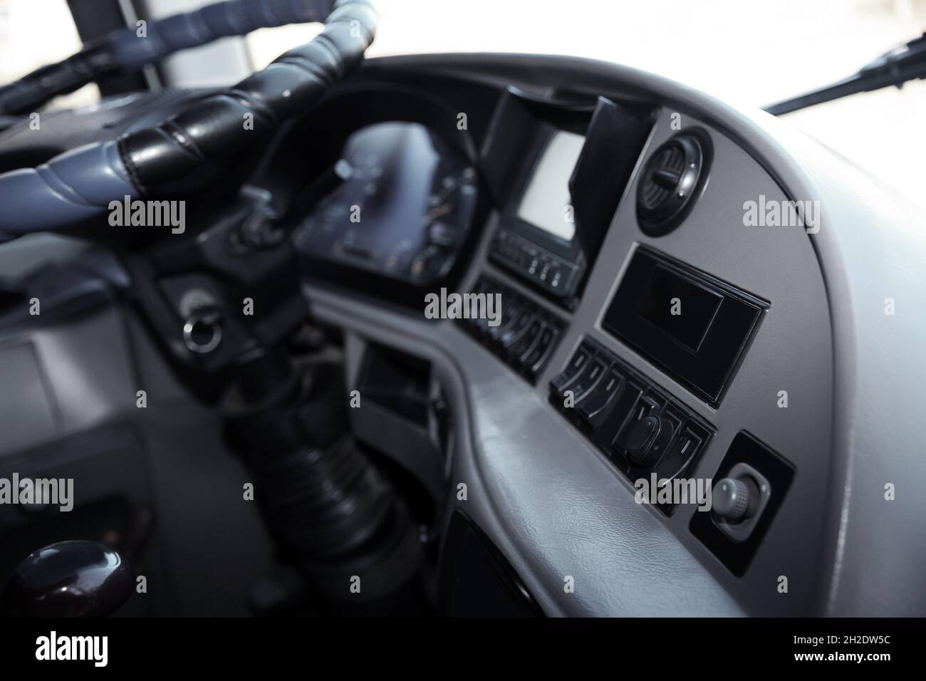 Professional driver's cab in modern bus, view of dashboard Stock Photo ...
