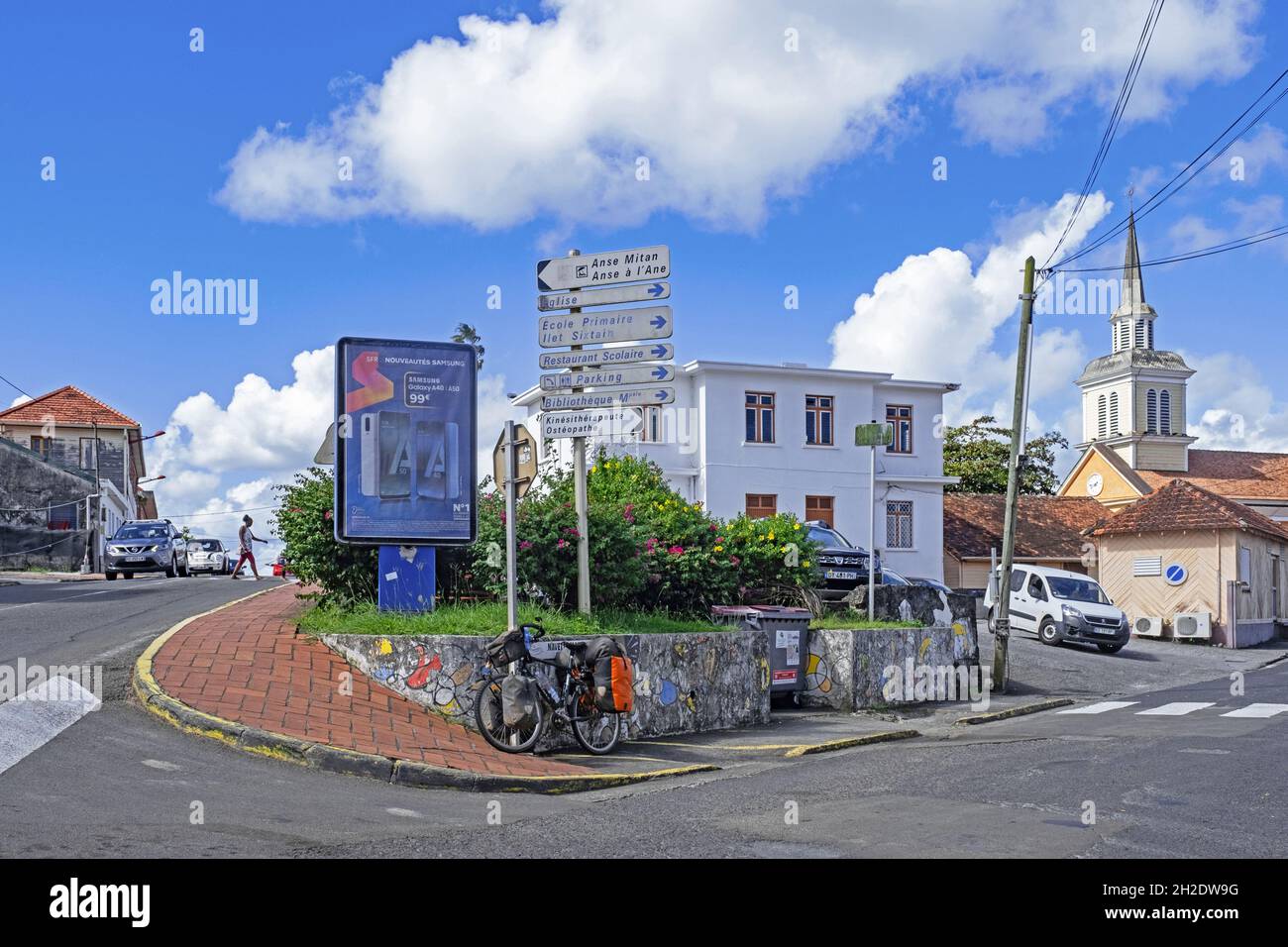 Streetscene at the village Morne-Vert showing church and French street ...