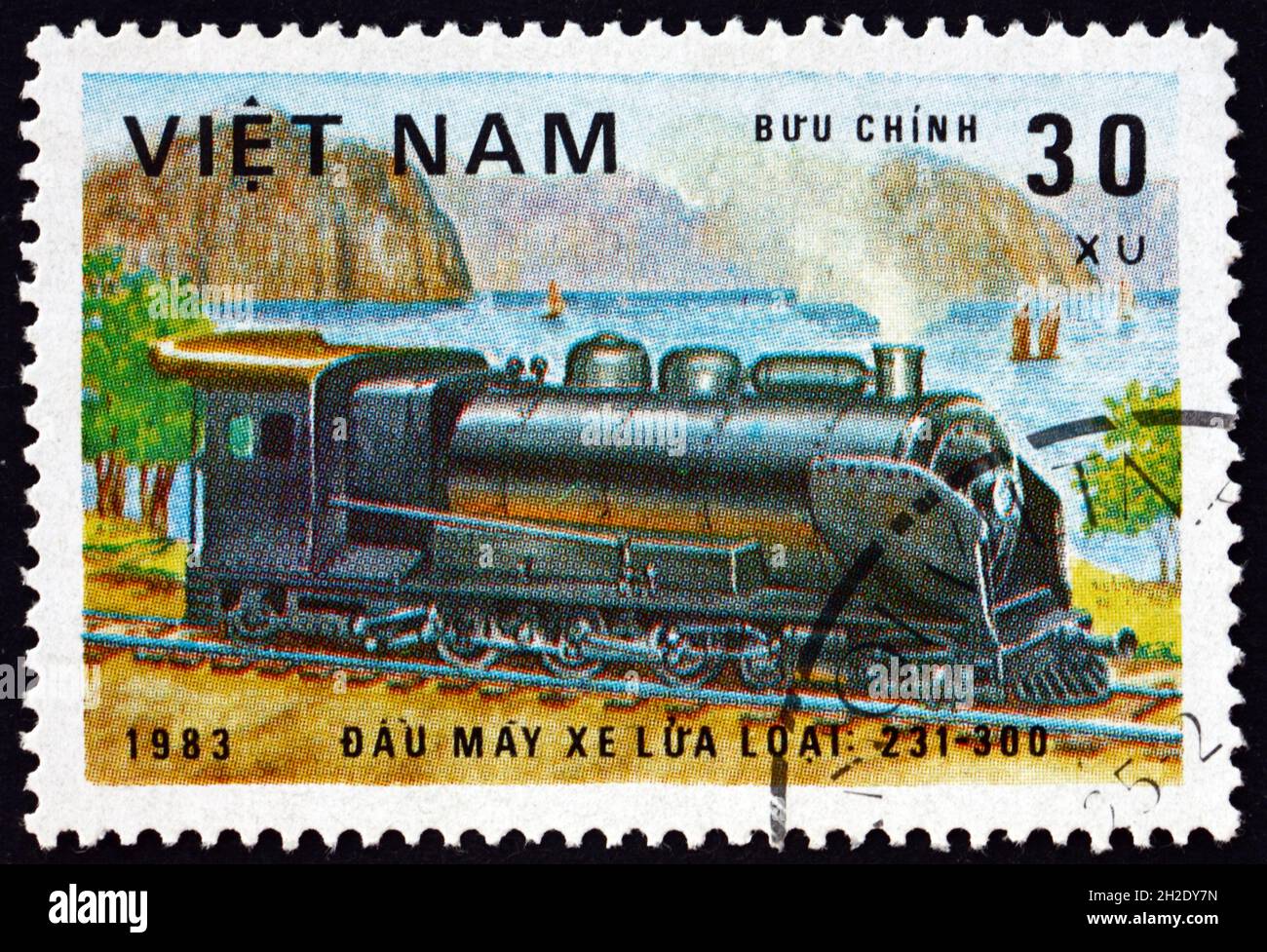 VIETNAM - CIRCA 1983: a stamp printed in Vietnam shows locomotive ...