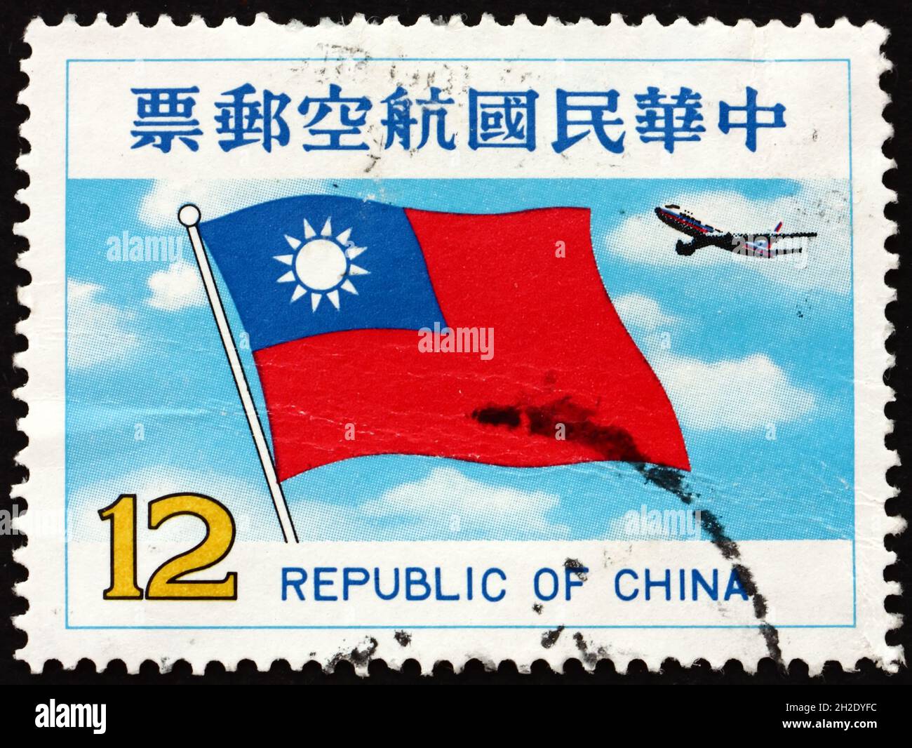 CHINA - CIRCA 1980: a stamp printed in the China shows China flag ...