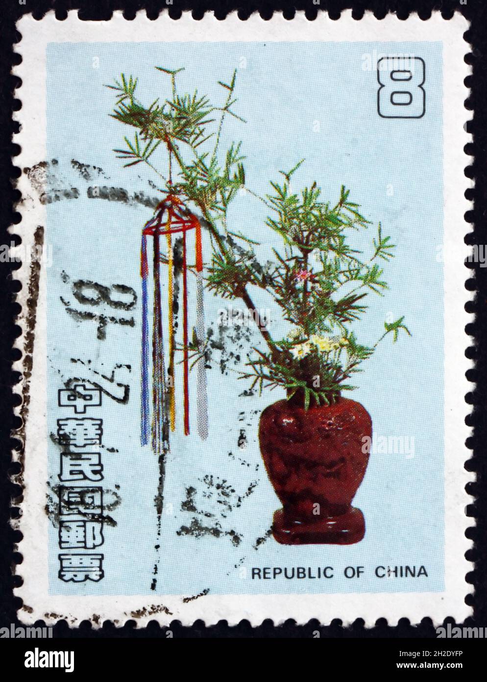 CHINA - CIRCA 1987: a stamp printed in the China shows flower ...