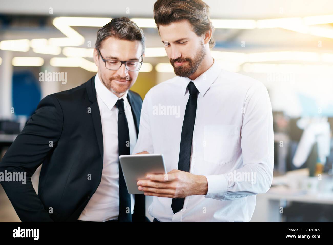 Wireless technology connecting colleagues once again Stock Photo - Alamy