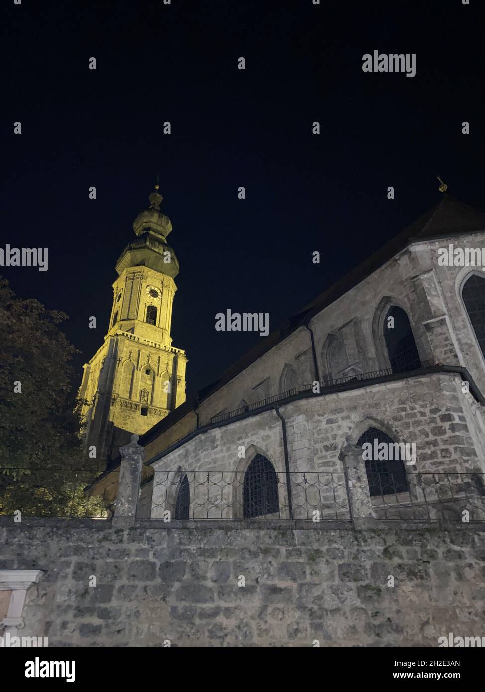 Illuminated tower of a castle at night Stock Photo - Alamy
