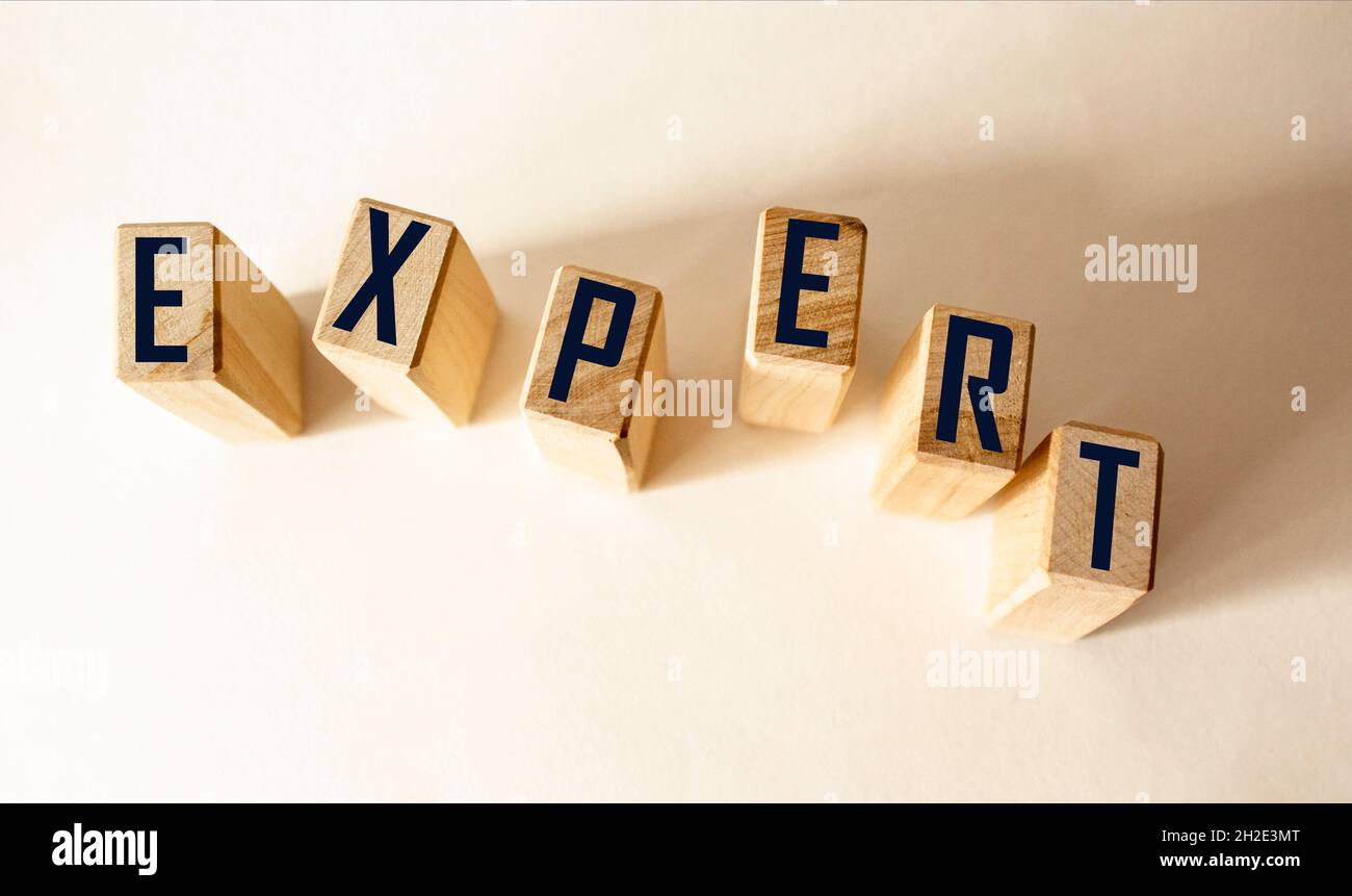 expert word written on wood block. expert text on table, concept Stock ...