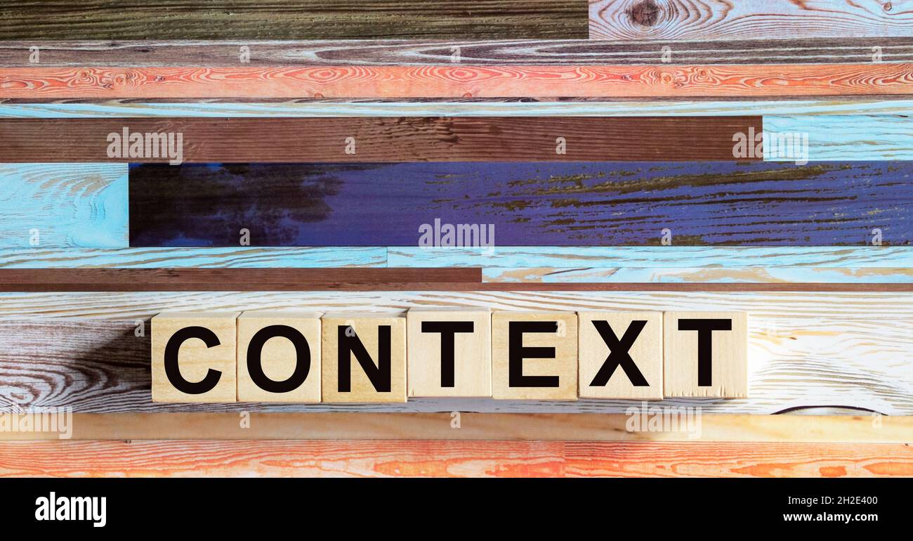 word context from gray wooden small letters with black font on an ...