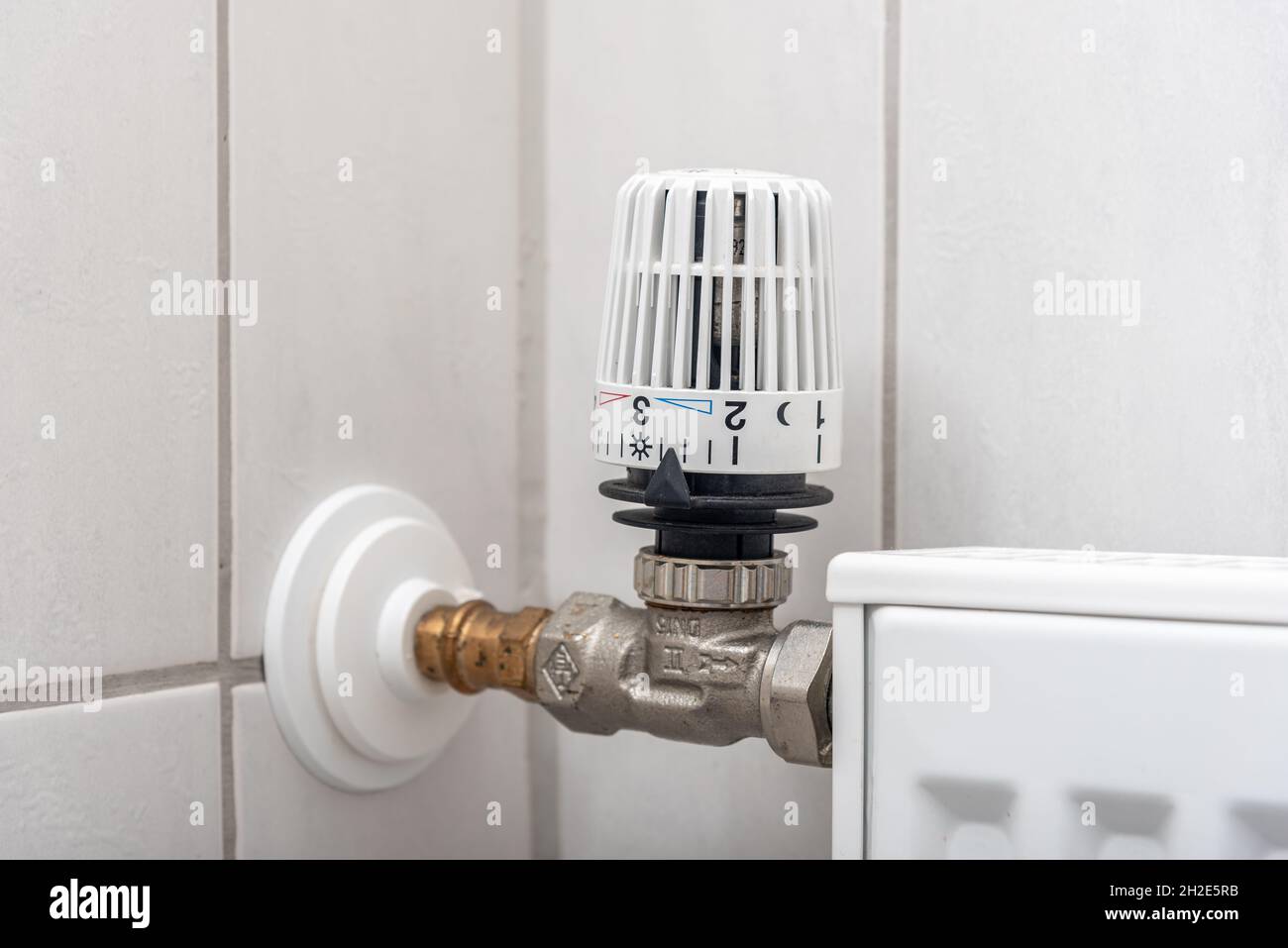 domestic radiator, showing the temperature control valve set at the ...