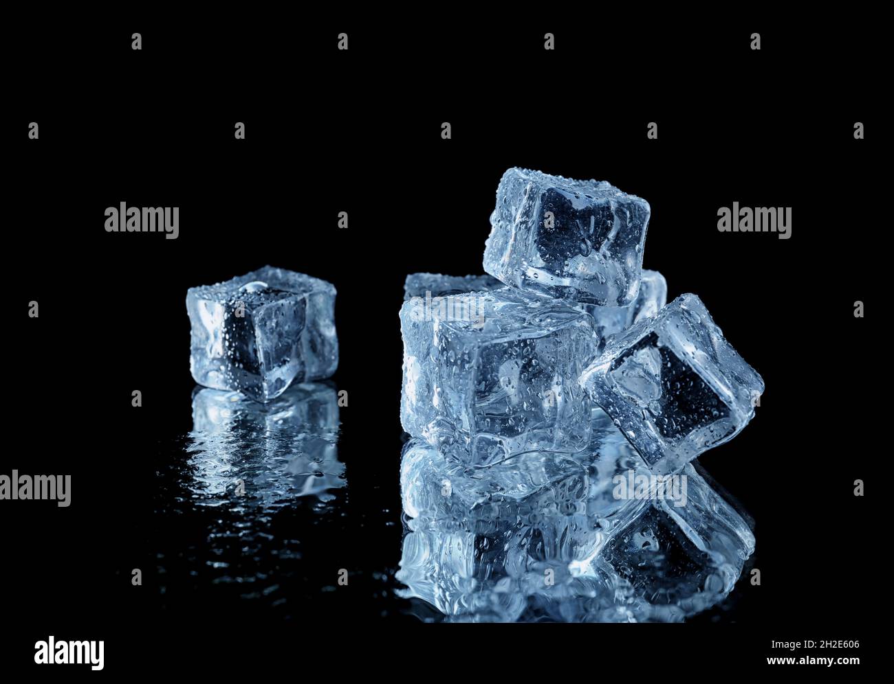 Transparent ice cubes on black mirror surface Stock Photo - Alamy