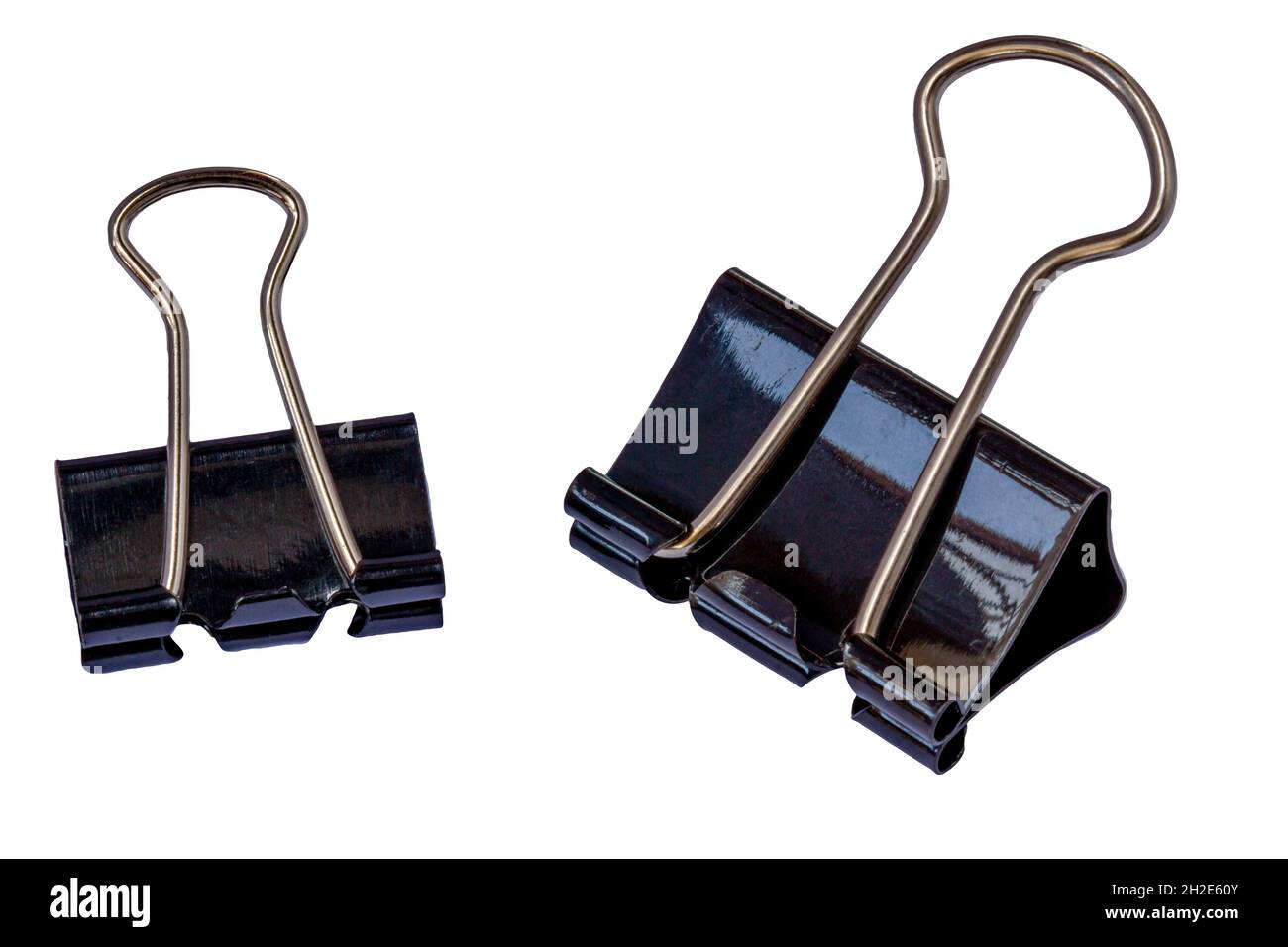 Two black metal paper clips, isolated with a white background, for ...