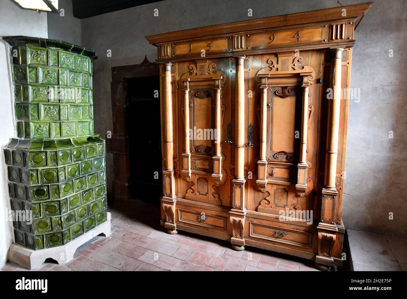Old 16th century wardrobe furniture & ceramic stove heater at Château ...
