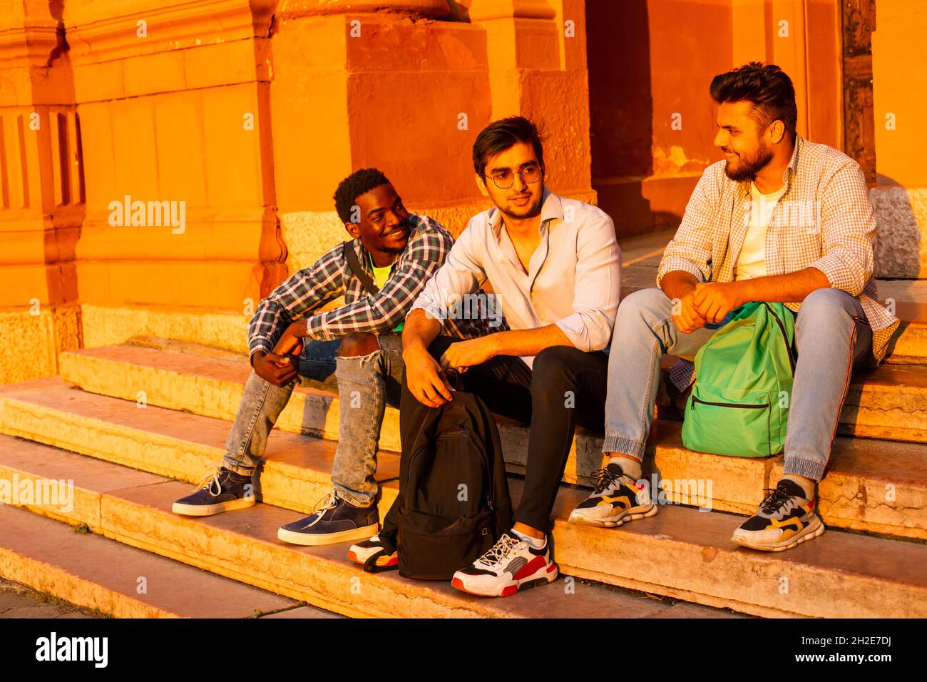 The multi-ethnic students have fun communicating outdoors Stock Photo ...