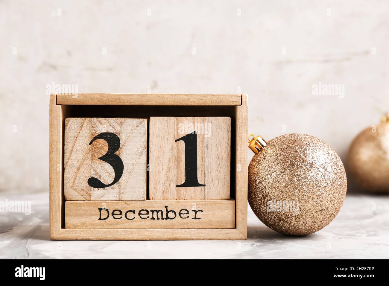 Wooden block calendar and decor on table. Christmas countdown Stock ...