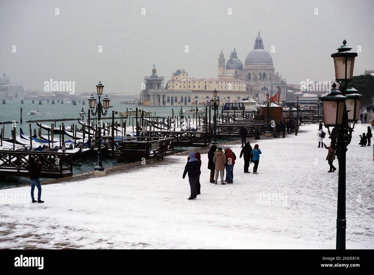 Photo of red umbrella in the snow hi-res stock photography and images ...
