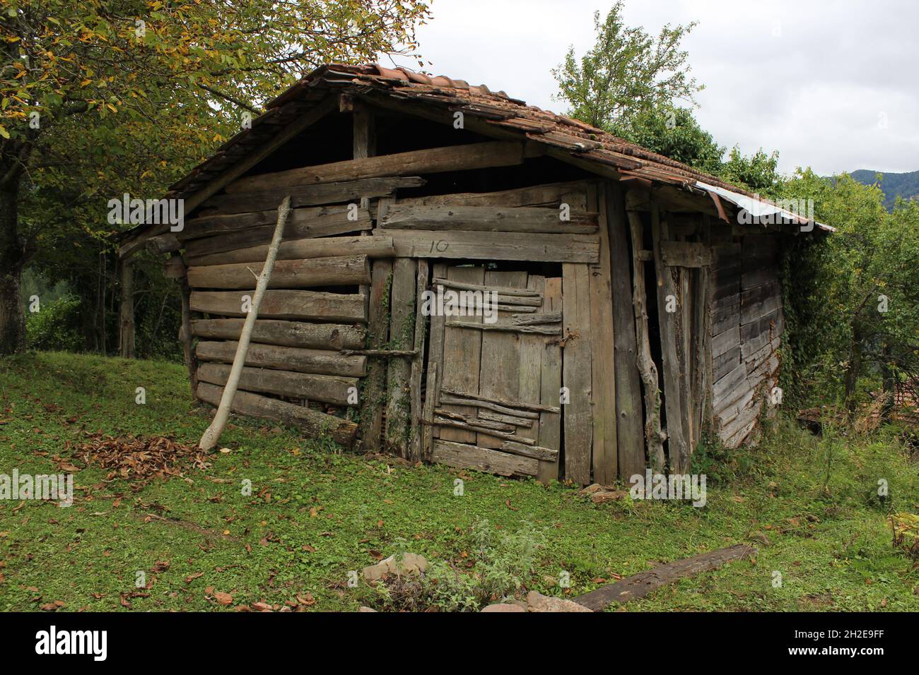 old wooden house nature landscape, old buildings Stock Photo - Alamy