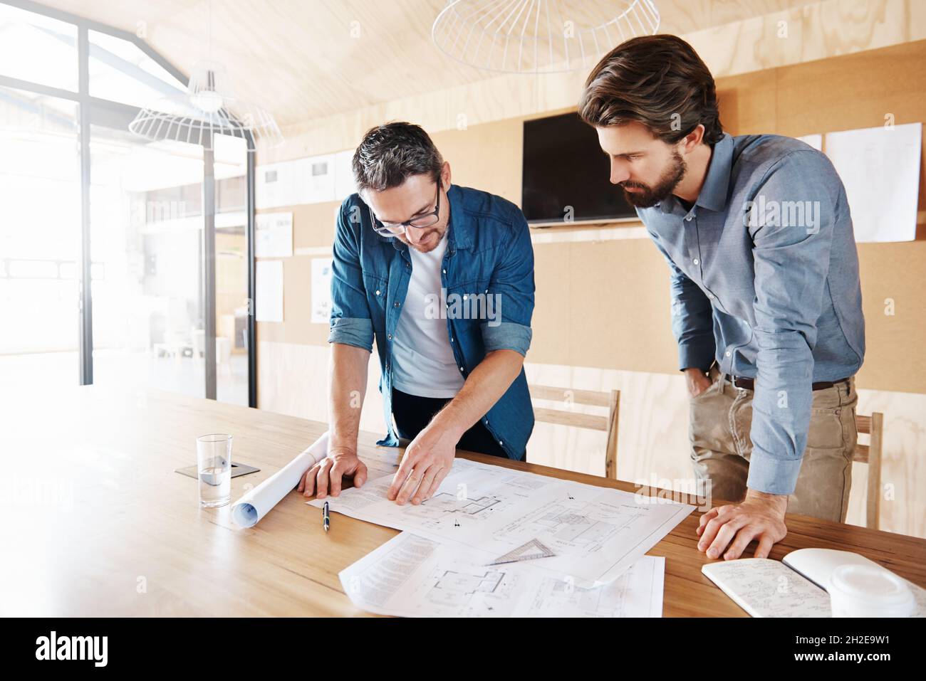 Moving forward with their designs Stock Photo - Alamy