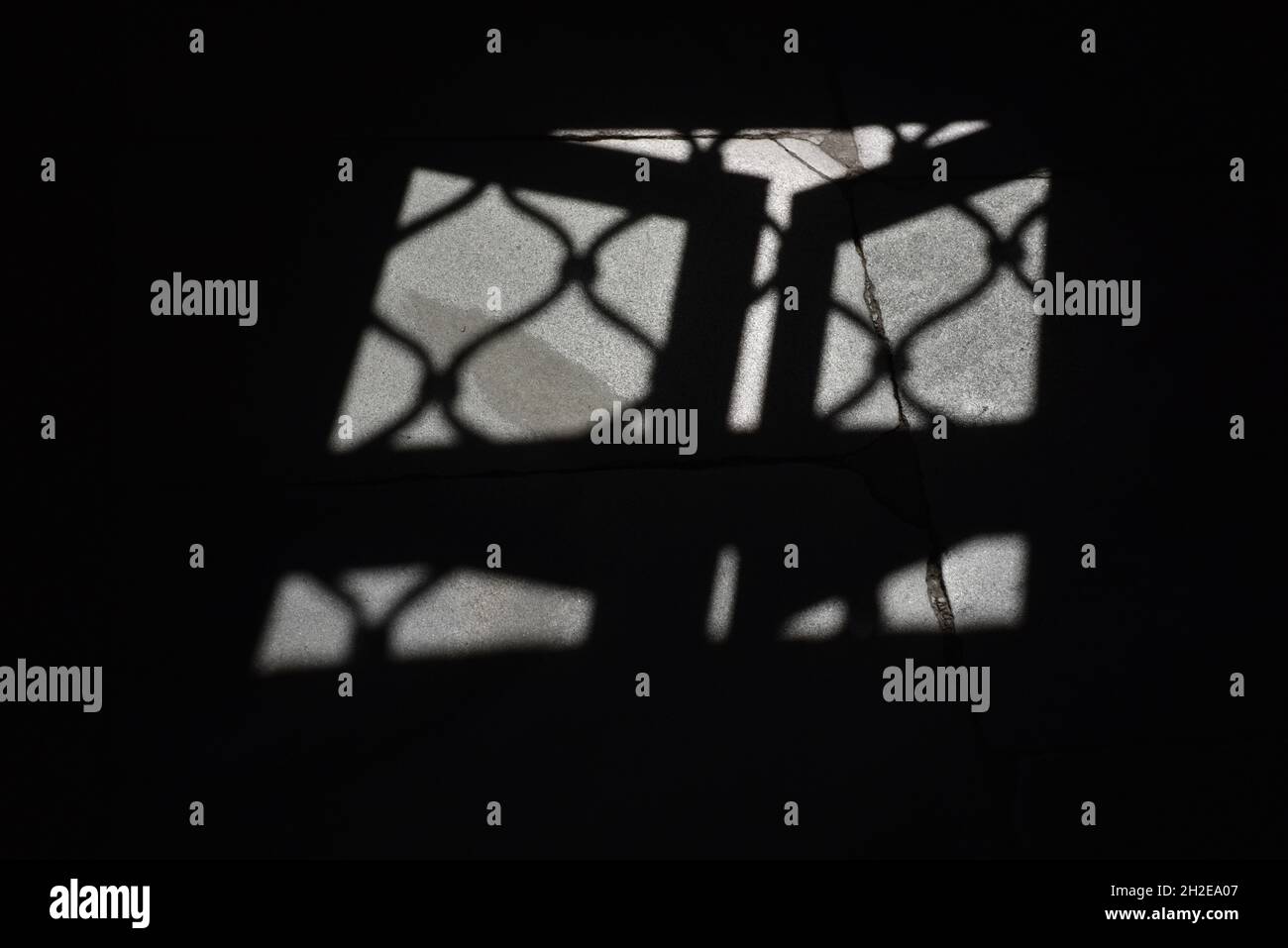 Shadow of the window in a dark room Stock Photo - Alamy