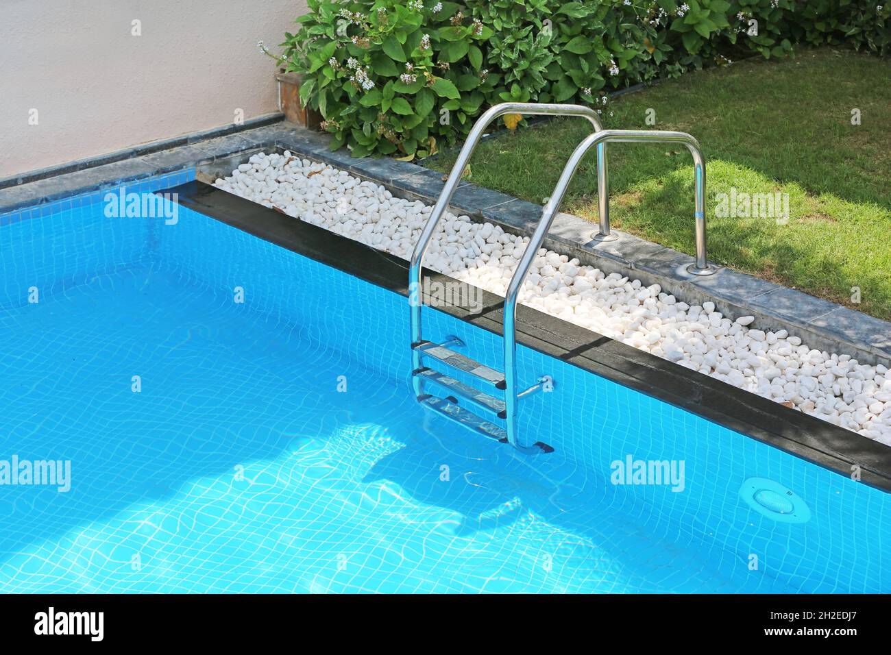 Modern swimming pool with stairs, outdoors Stock Photo - Alamy