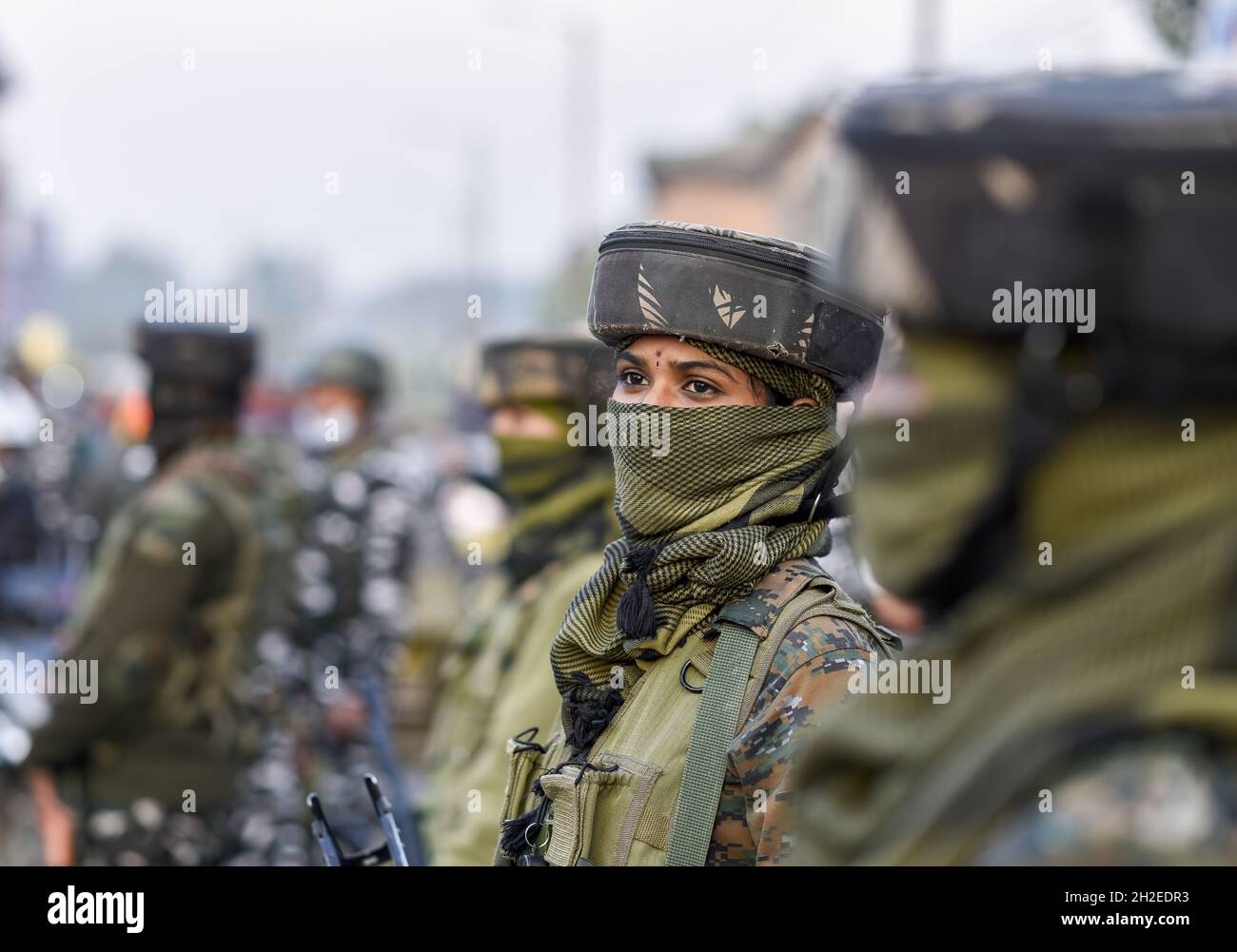Indian women paramilitary troopers stand alert during a surprise ...