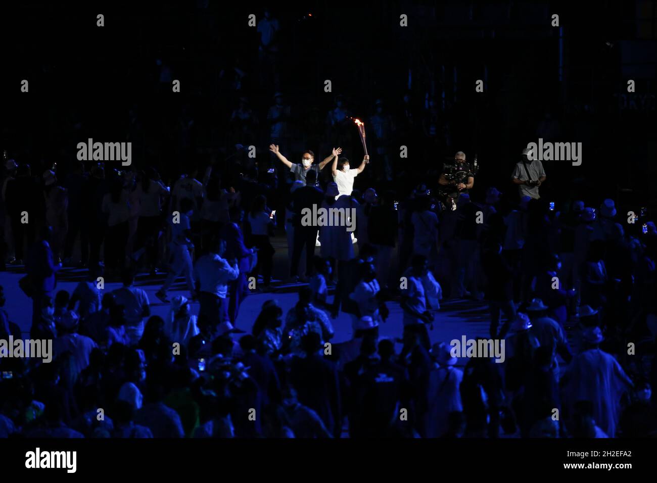 JULY 23rd, 2021 - TOKYO, JAPAN: The olympic flame is carried by ...