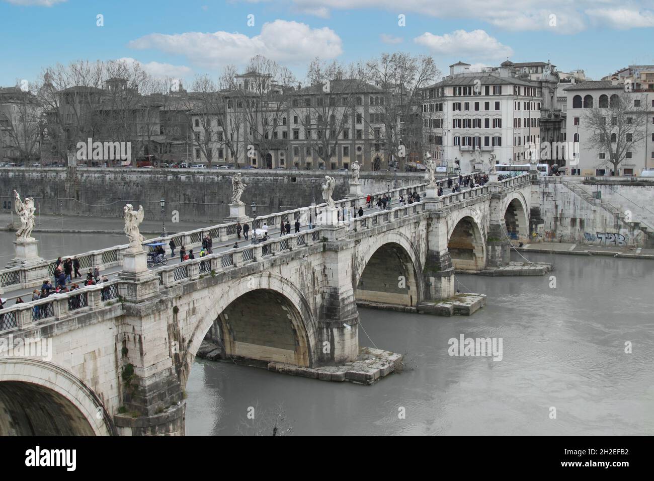 Ancient five-arched bridge with ten statues of angels over the Tiber ...