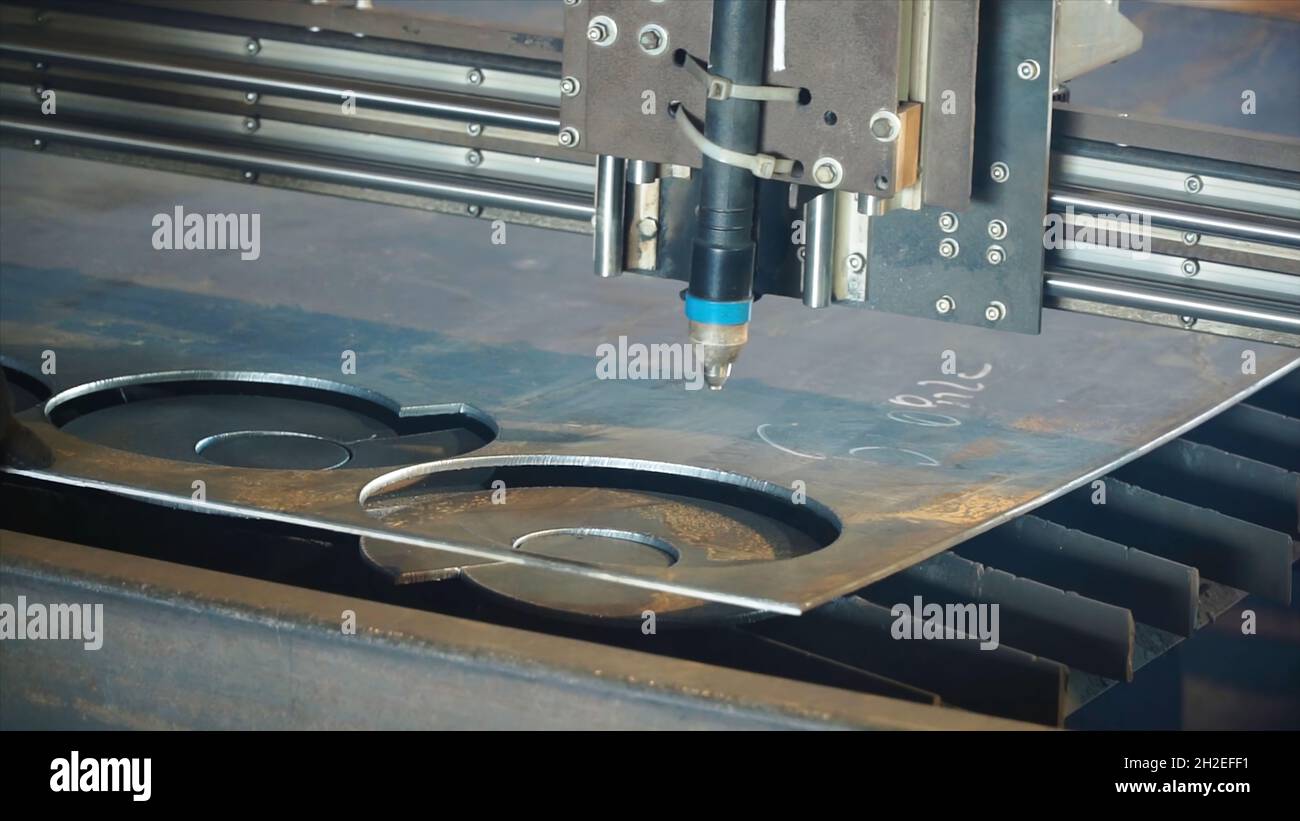 Industrial plasma machine cutting of metal plate. Clip. Cutting metal ...