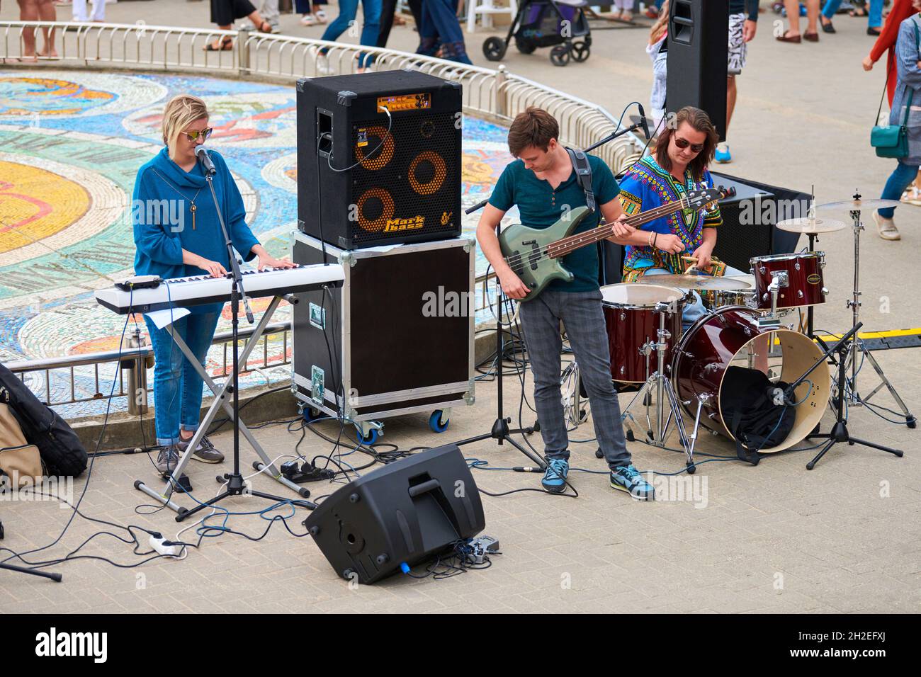 Female bassist singing on stage hi-res stock photography and images - Alamy