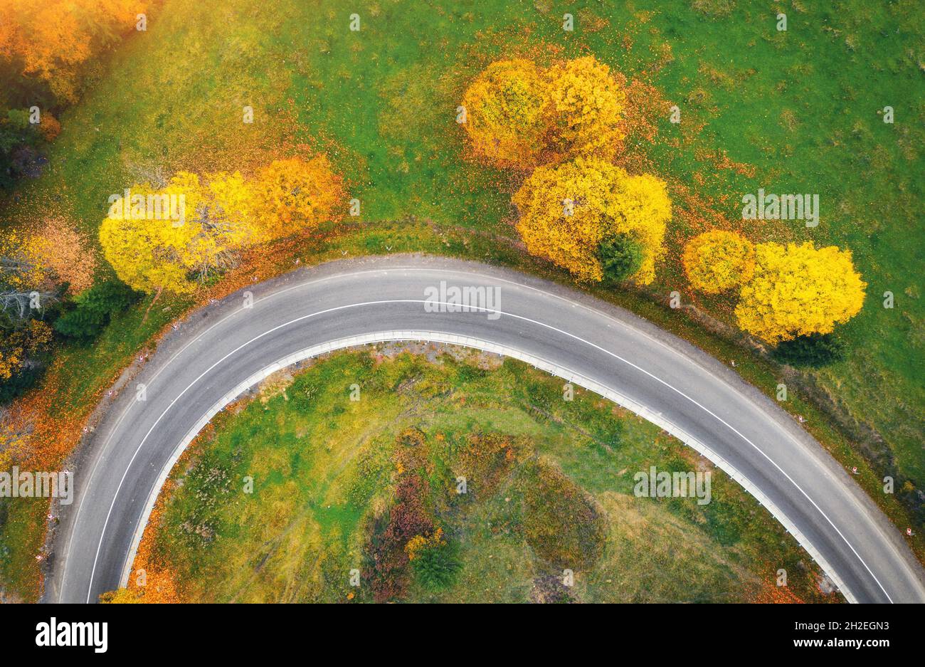 Aerial view of winding road hi-res stock photography and images - Alamy