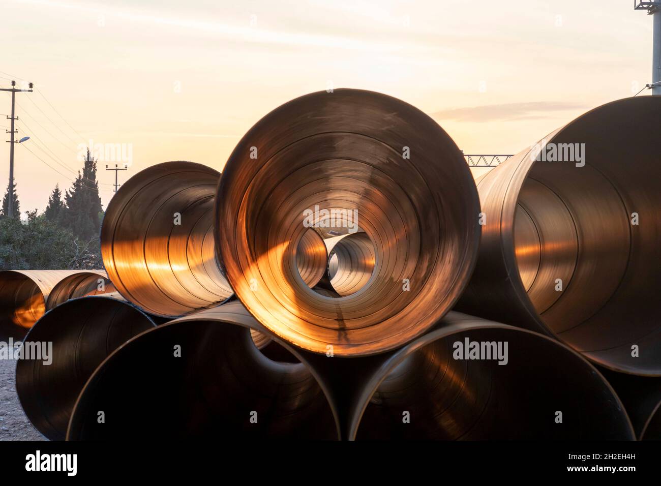 hollow large iron sewer pipes Stock Photo - Alamy